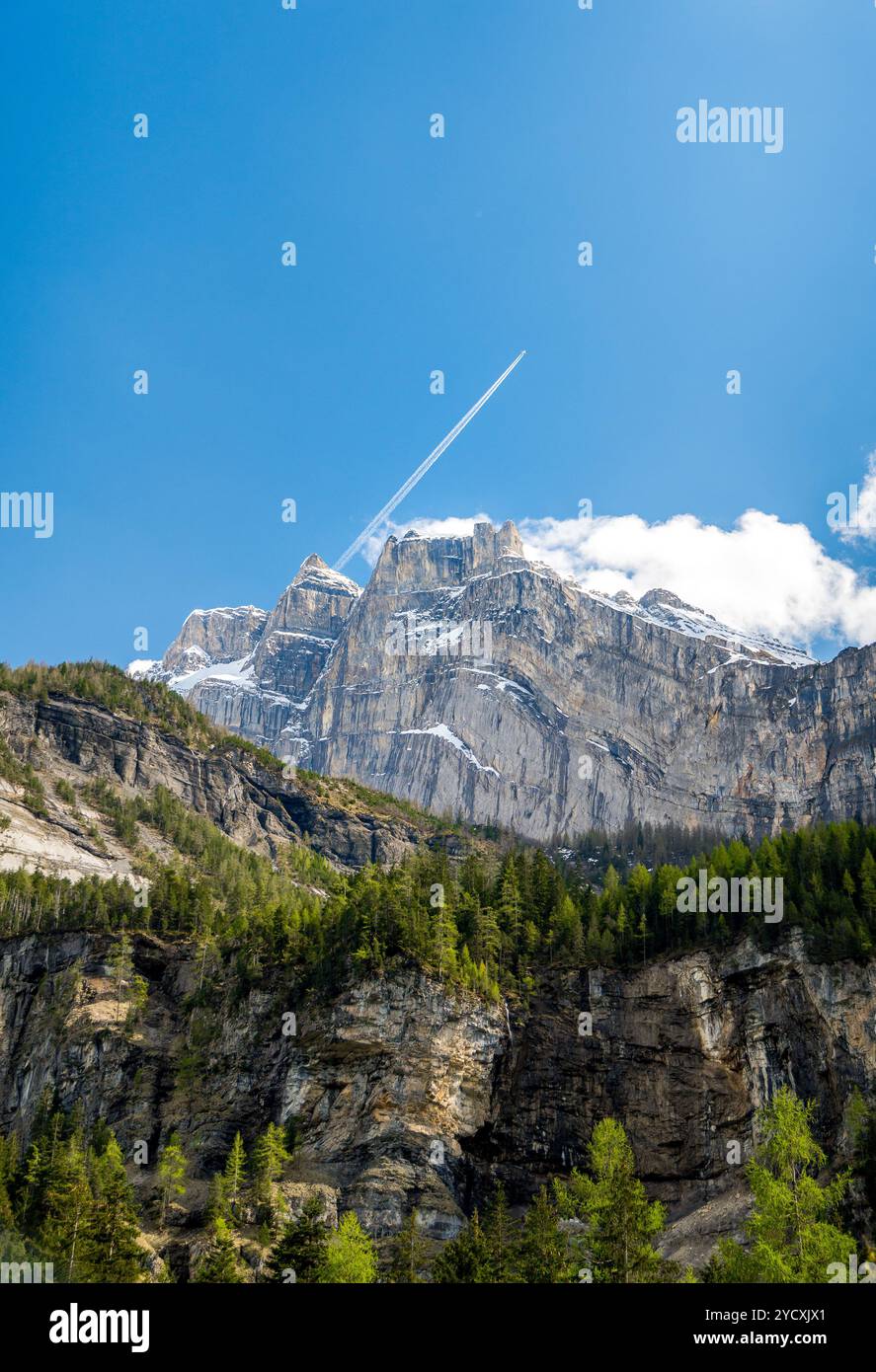 Crisp blue skies backdrop the towering peaks of the Swiss and French ...