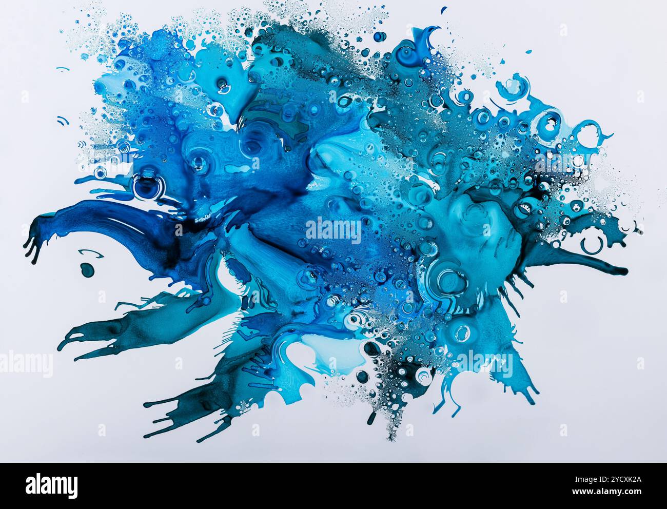 A captivating abstract composition featuring dynamic blue ink splashes ...