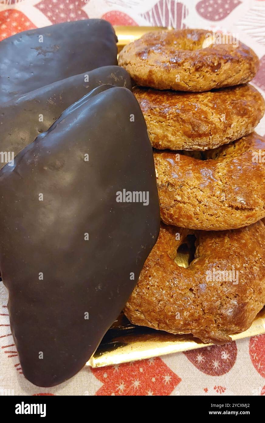 Traditional italian christmas sweets with chocolate and almonds lying ...