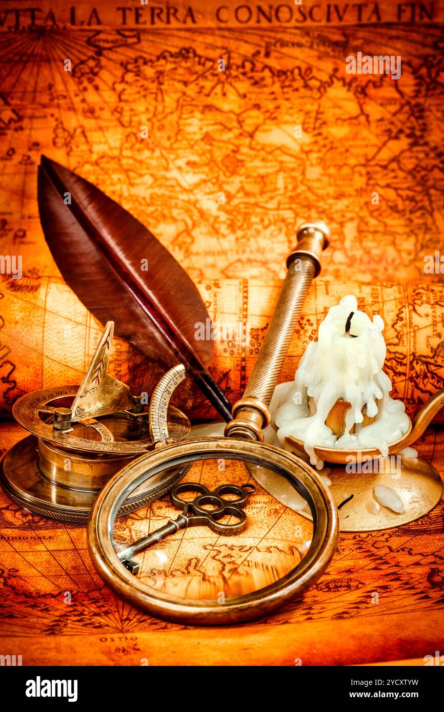 Vintage compass, magnifying glass, pocket watch, quill pen, spyglass ...