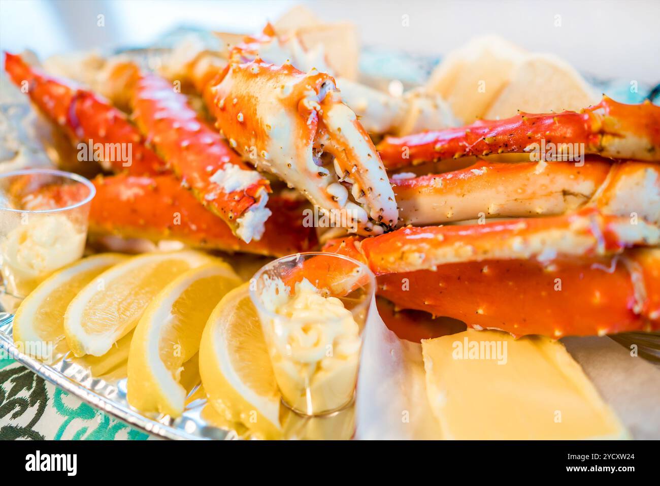 Red king crab legs with fresh lemon slices Stock Photo - Alamy