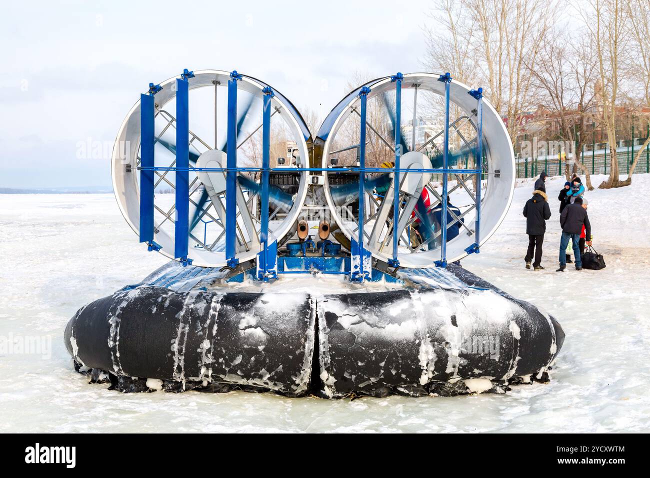 Passenger hovercraft on the ice of the frozen Volga river in winter day ...