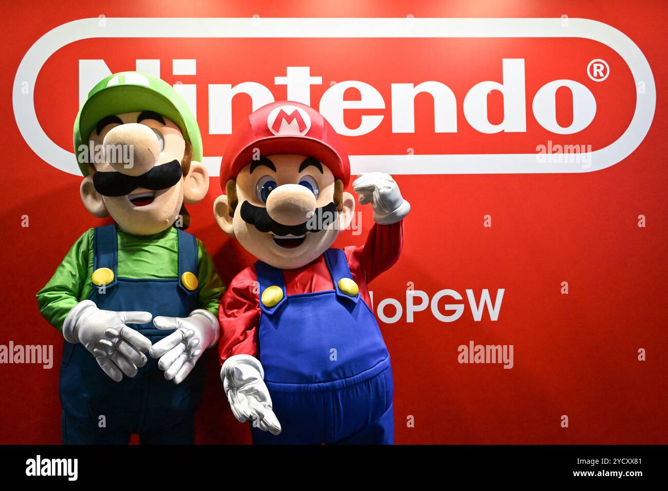 Paris, France. 24th Oct, 2024. Participants wearing Mario and Luigi ...