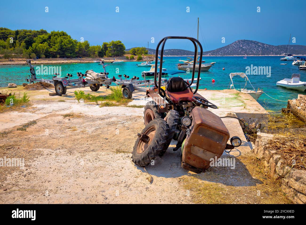 Crushed tractor by the sea on island Prvic Stock Photo - Alamy
