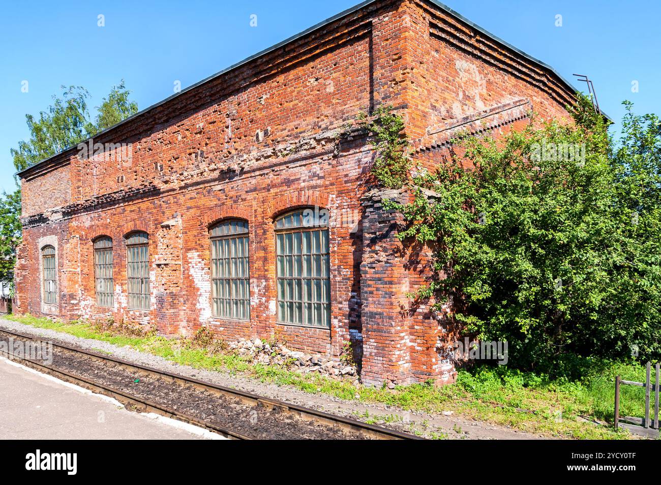 Old depot of red brick at the provincial railway station Stock Photo ...