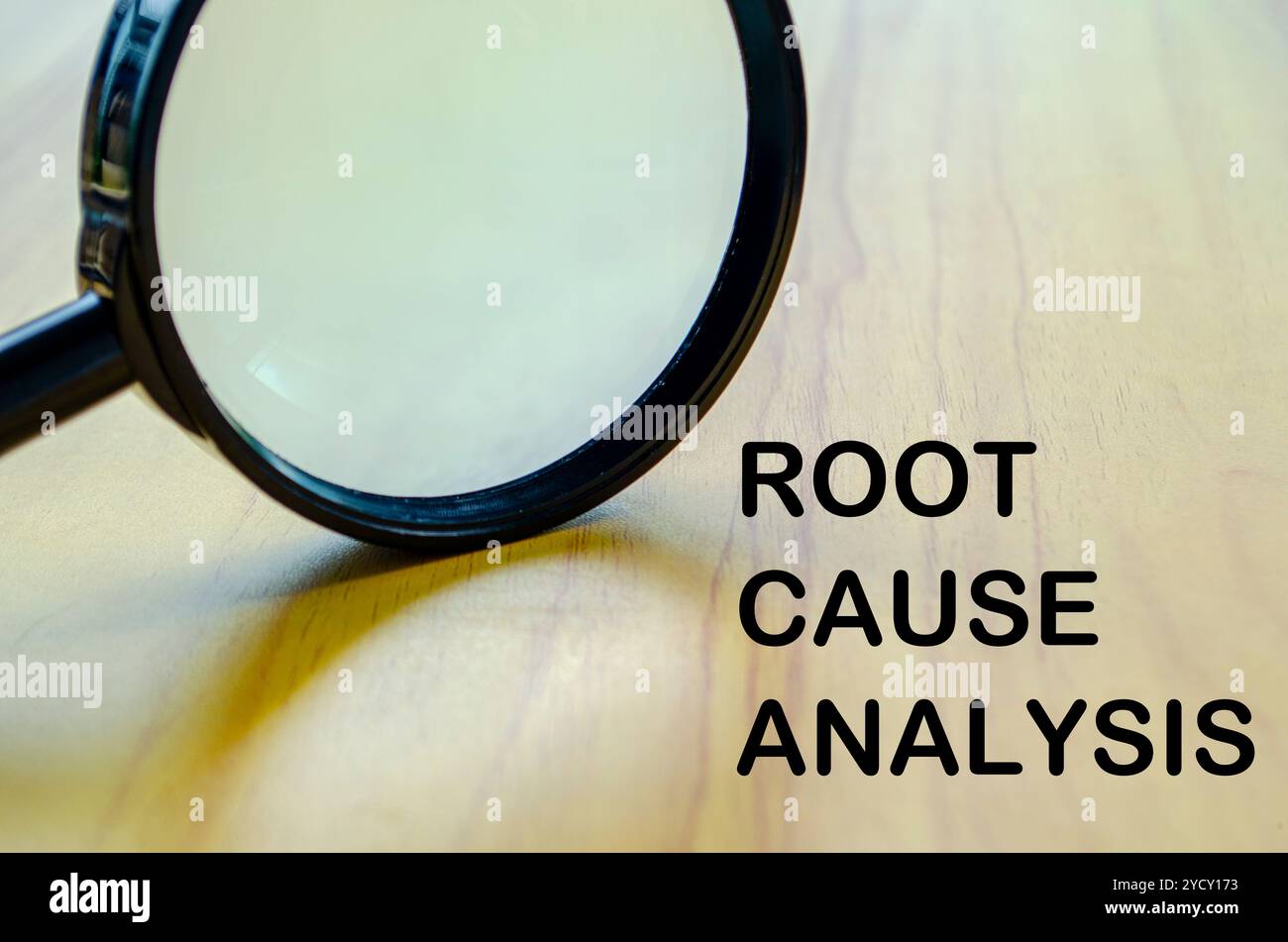 Root Cause Analysis text with magnifying glass background. Business ...