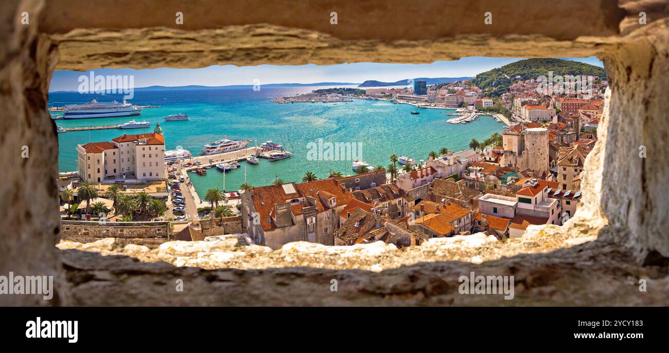Split waterfront aerial panoramic view through stone window Stock Photo ...