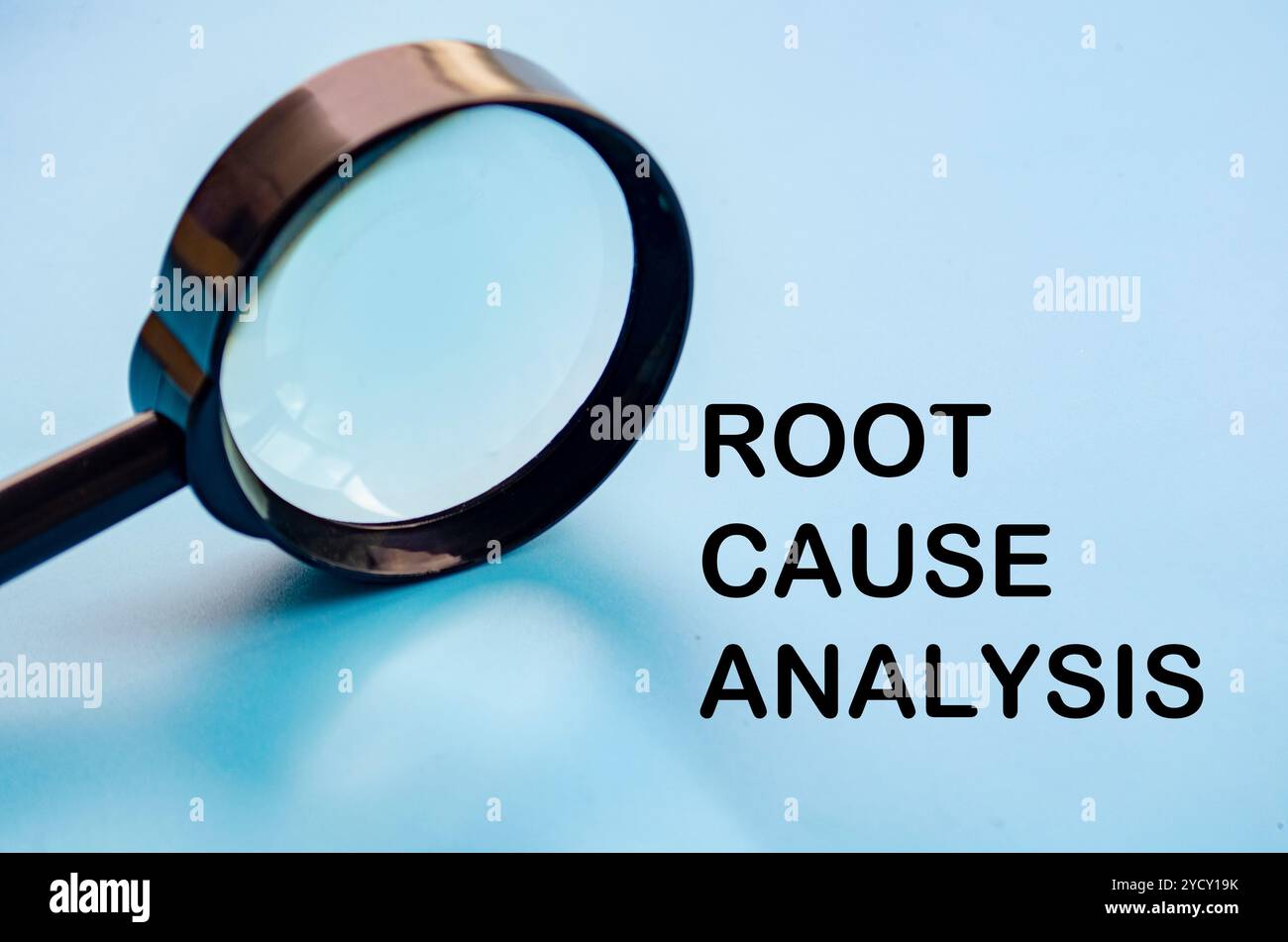 Root Cause Analysis text on blue cover with magnifying glass background ...
