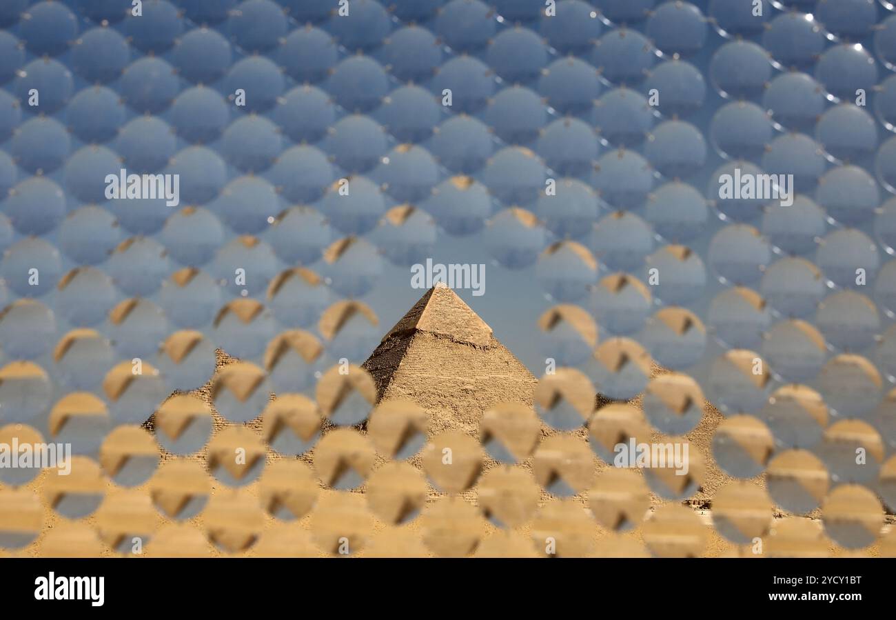 Giza, Egypt. 24th Oct, 2024. The pyramid is seen through an artistic ...
