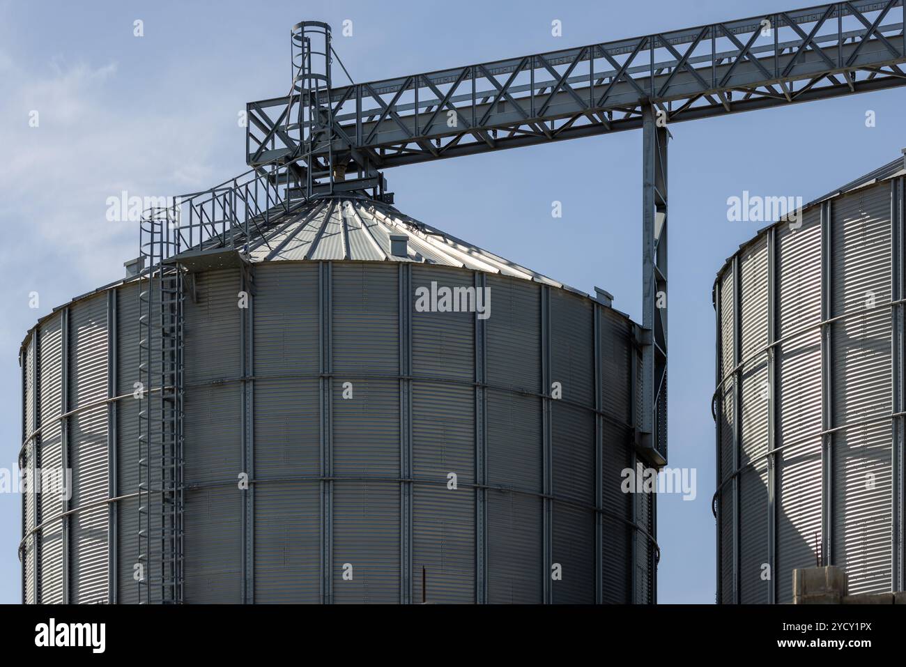 metal grain silos with elevator loading constructions Stock Photo - Alamy