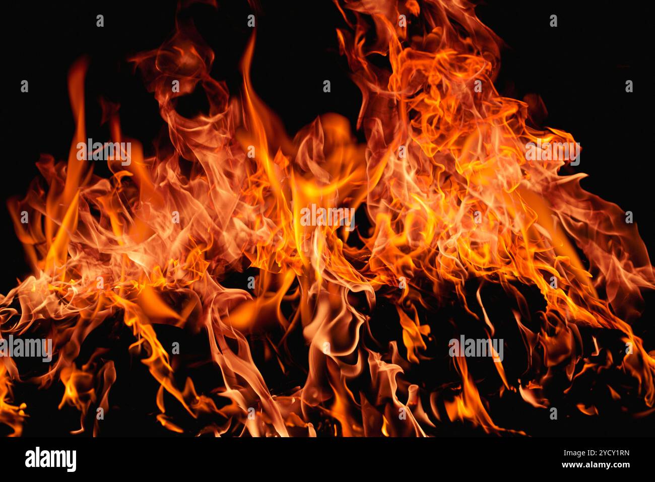 Fire flame background. Hell bonfire. Texture of fire on a black ...