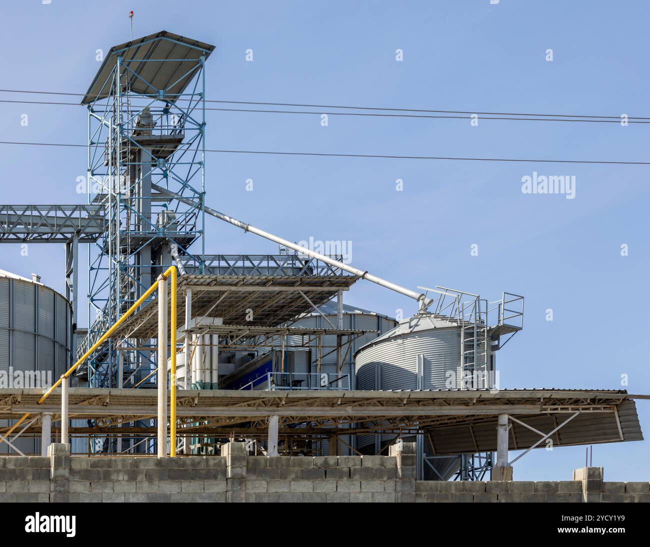 metal grain silos with elevator loading constructions Stock Photo - Alamy