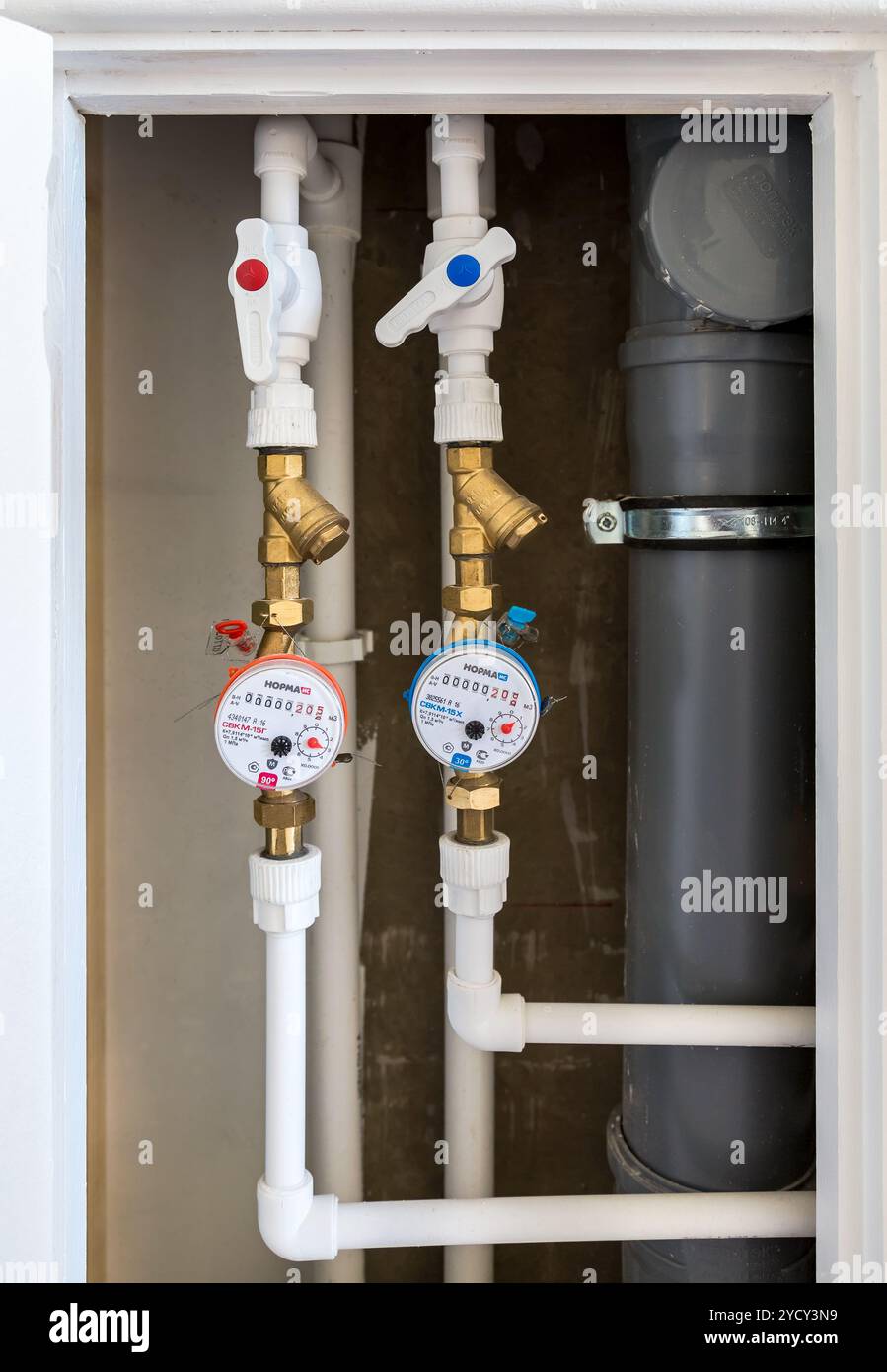 Water meters. Counters of hot and cold water Stock Photo - Alamy