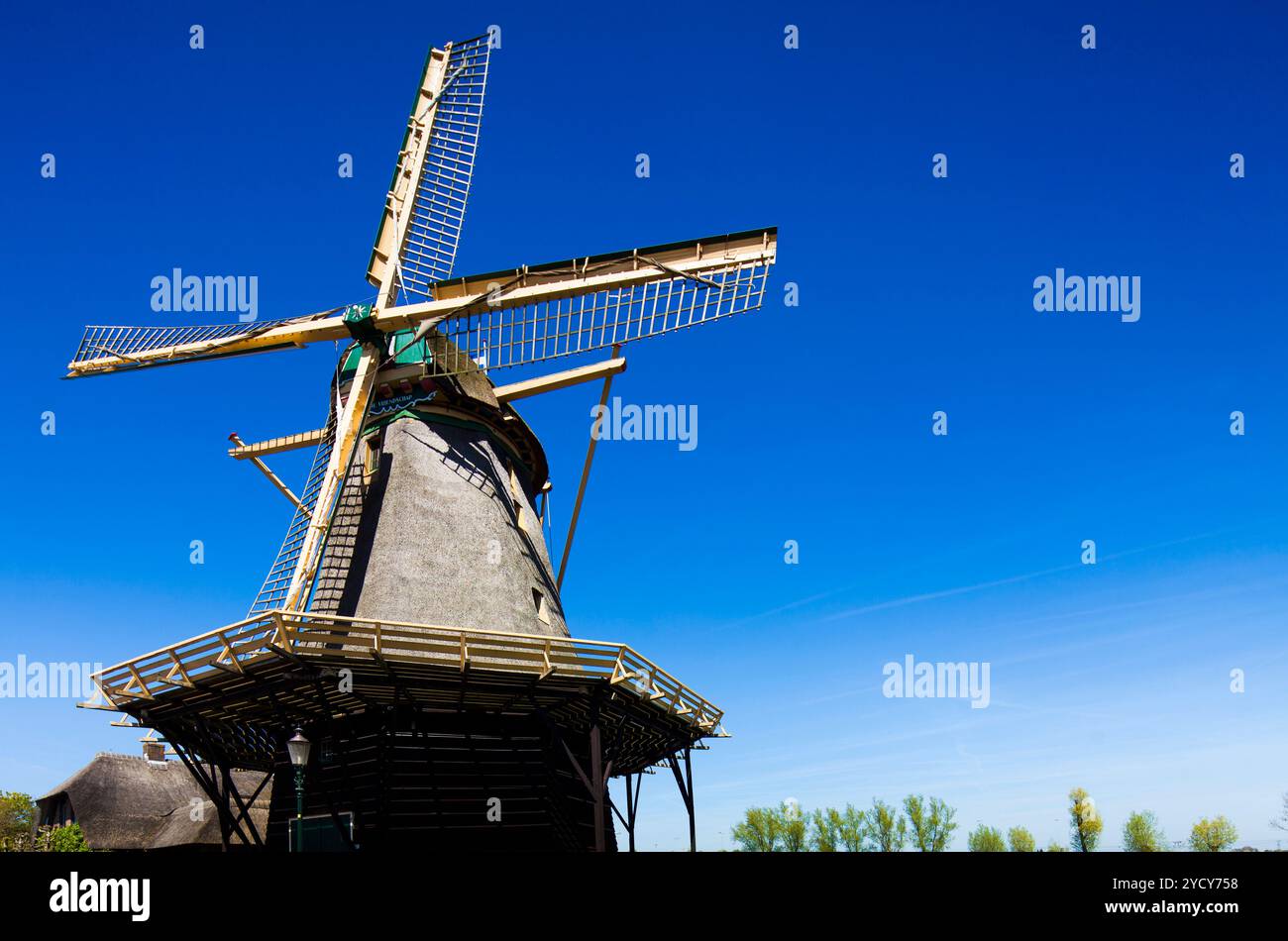 Windmill in fresh green field hi-res stock photography and images - Alamy