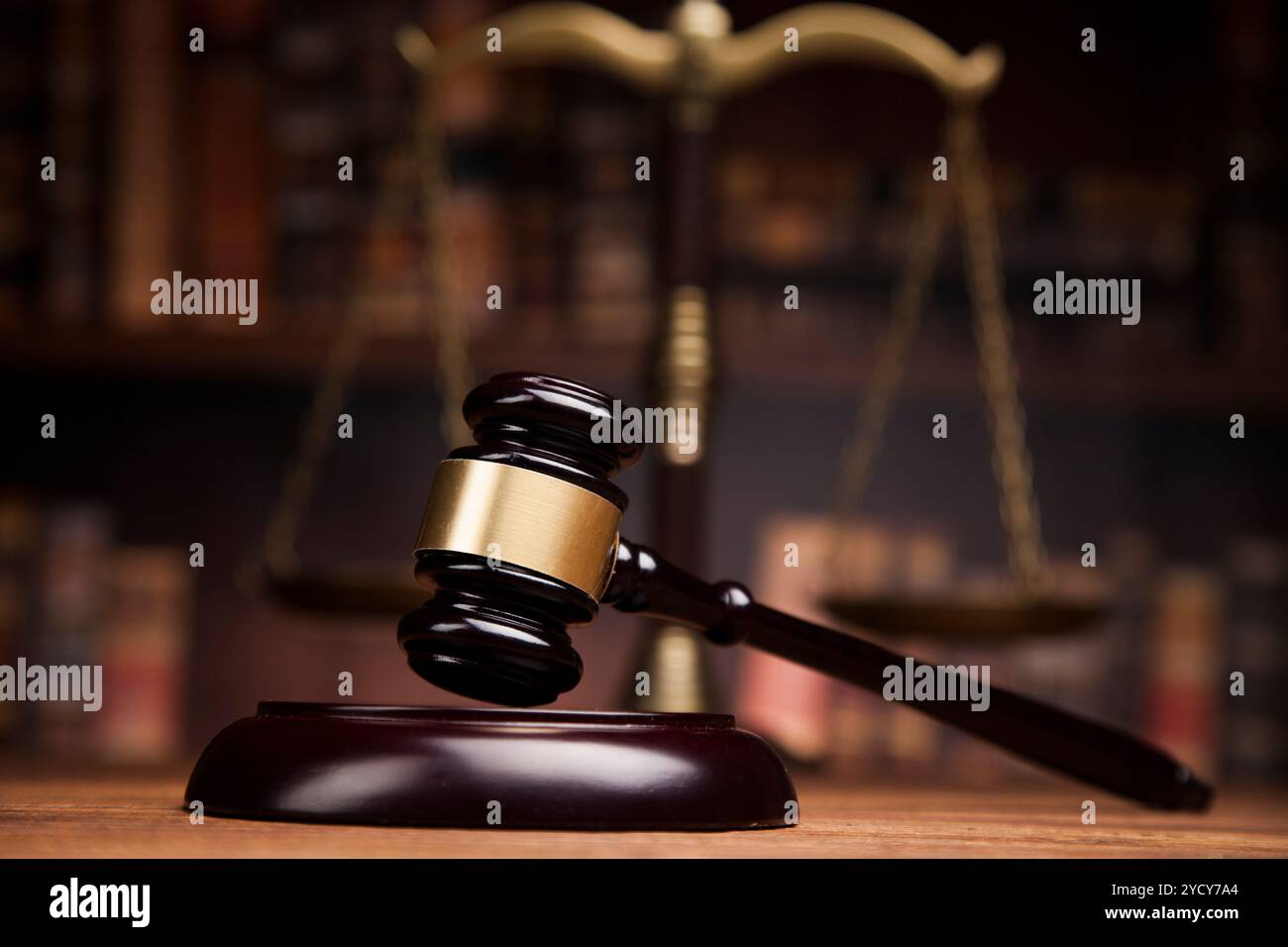 Law theme, mallet of the judge, justice scale, books, wooden desk Stock Photo - Alamy