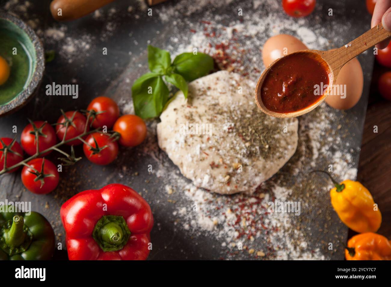 Homemade Italian pizza preparation Stock Photo - Alamy