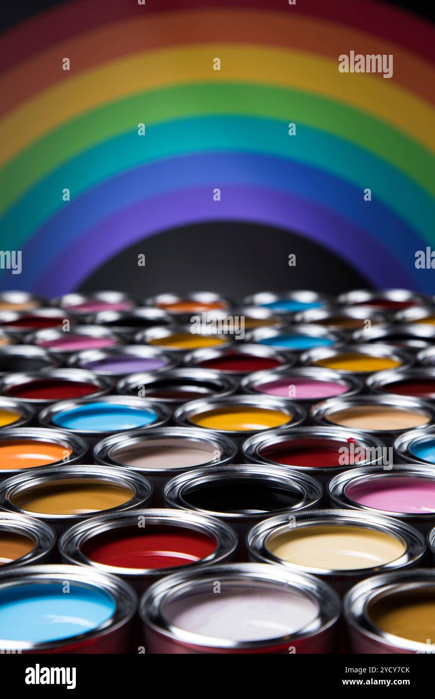 Rainbow colors, Open cans of paint Stock Photo - Alamy