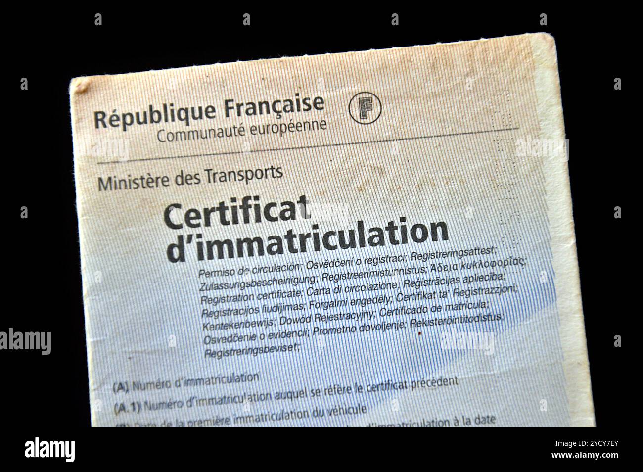In this illustration photo, a vehicle registration certificate is seen ...