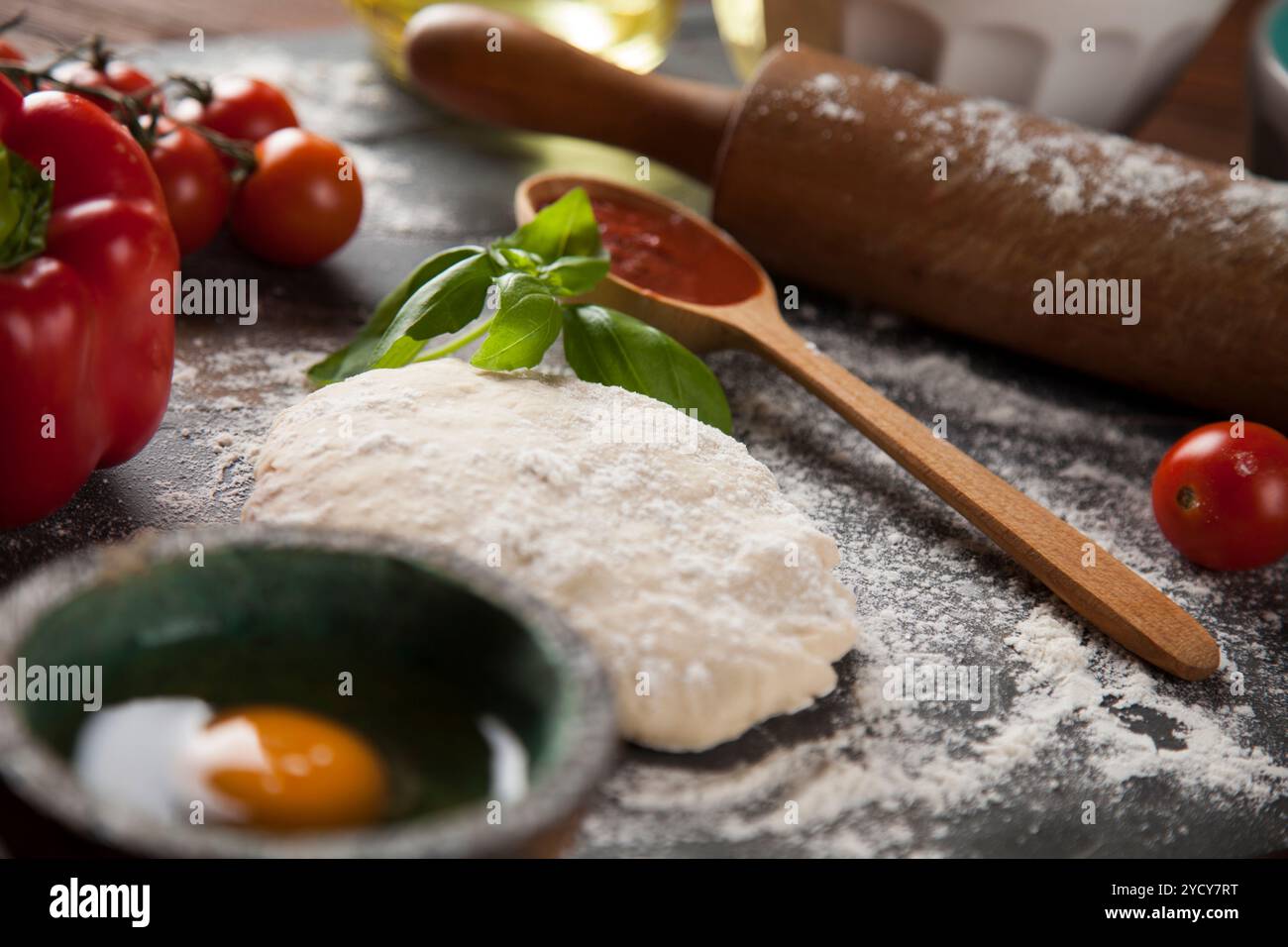 Homemade Italian pizza preparation Stock Photo - Alamy