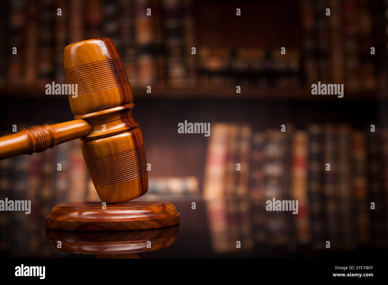 Law books, mallet of the judge, Courtroom background Stock Photo - Alamy