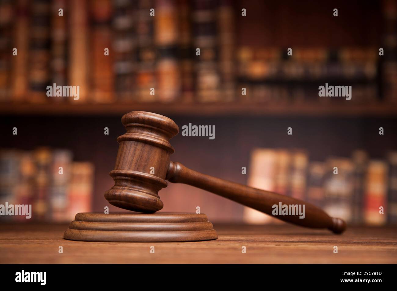 Law theme, mallet of the judge, justice scale, books, wooden desk Stock Photo - Alamy
