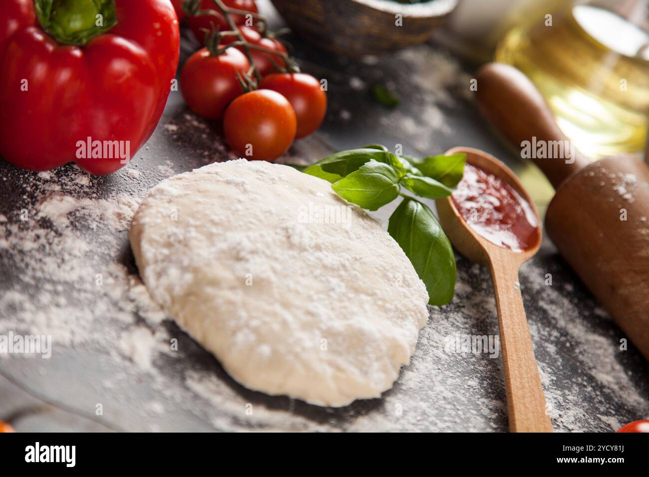 Homemade Italian pizza preparation Stock Photo - Alamy