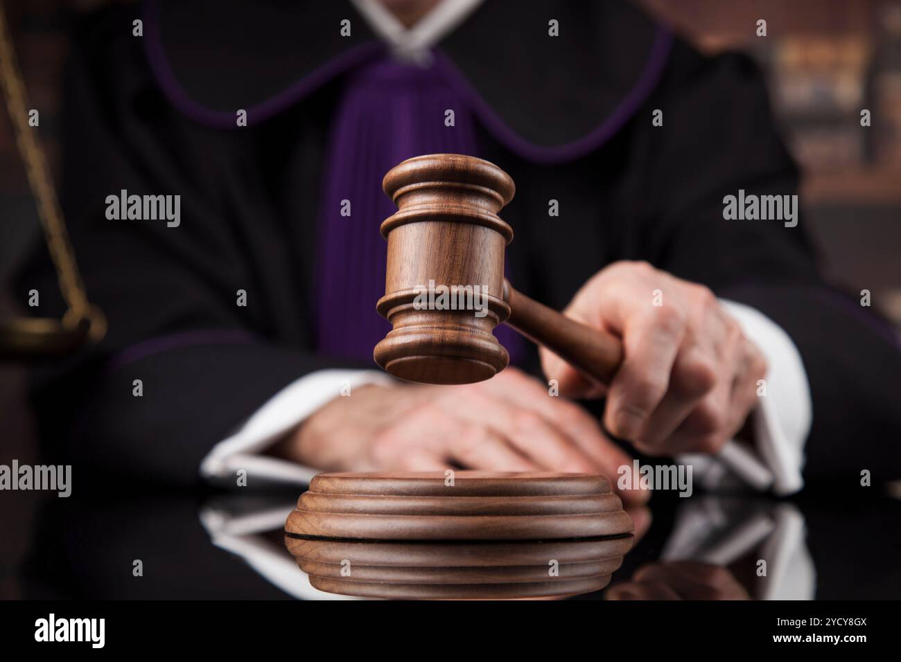 Judge, male judge in a courtroom striking the gavel Stock Photo - Alamy