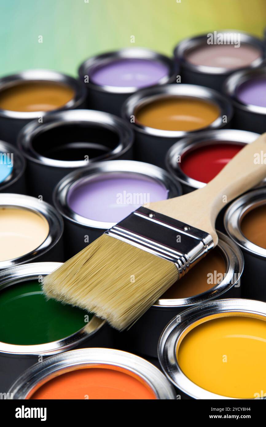Paint brush, tin can and color guide samples Stock Photo - Alamy