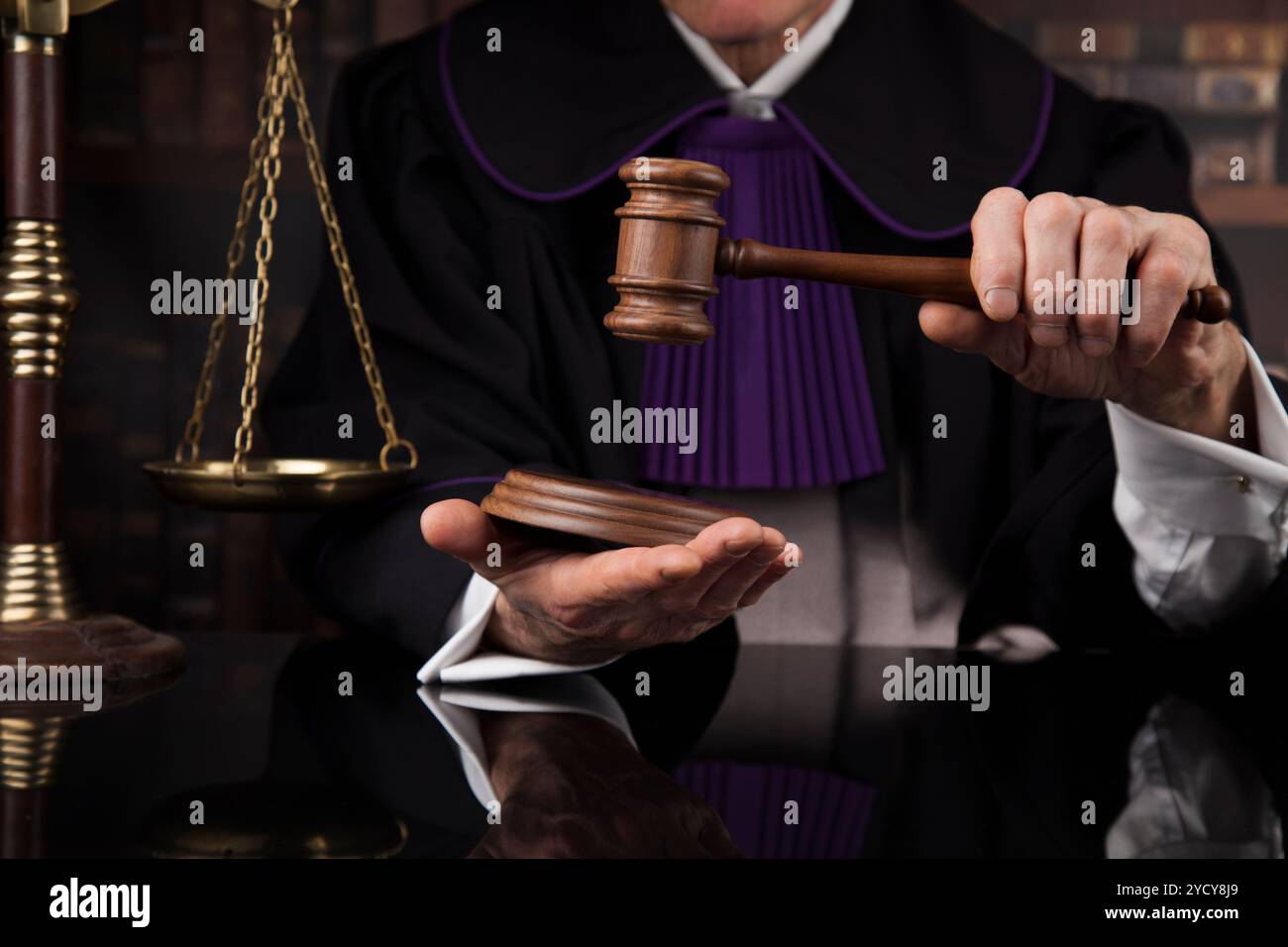 Judge, male judge in a courtroom striking the gavel Stock Photo - Alamy