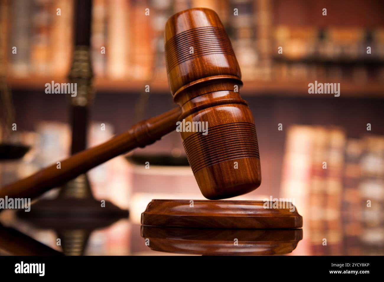 Law books, mallet of the judge, Courtroom background Stock Photo - Alamy
