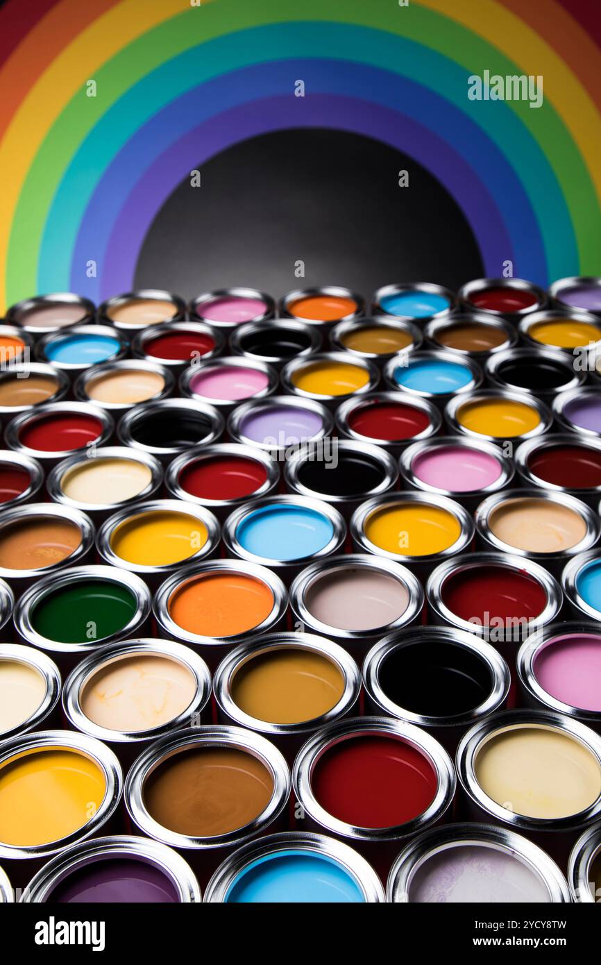 Rainbow, tin metal cans with color paint Stock Photo - Alamy