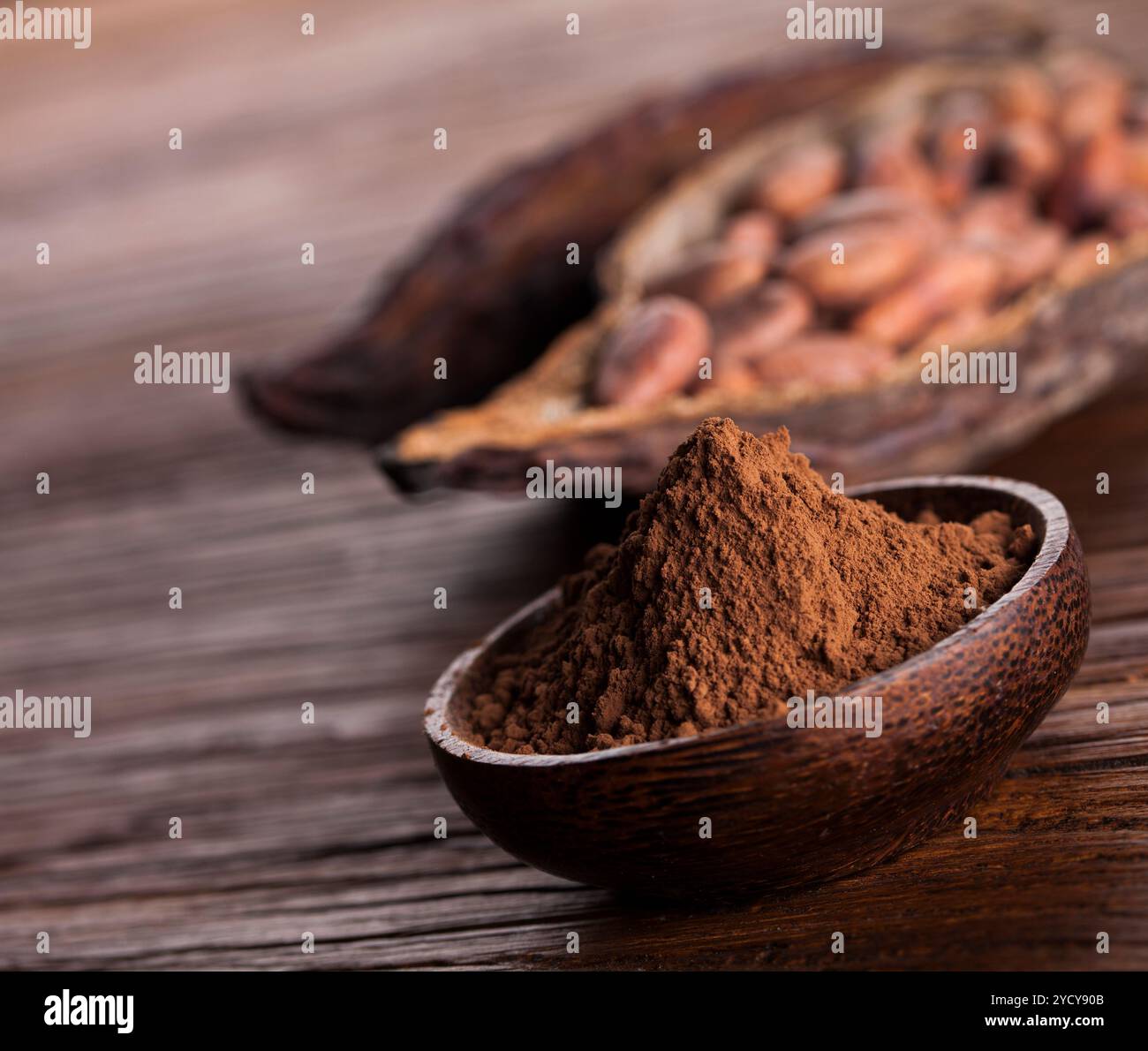 Cacao beans and powder and food dessert background Stock Photo - Alamy