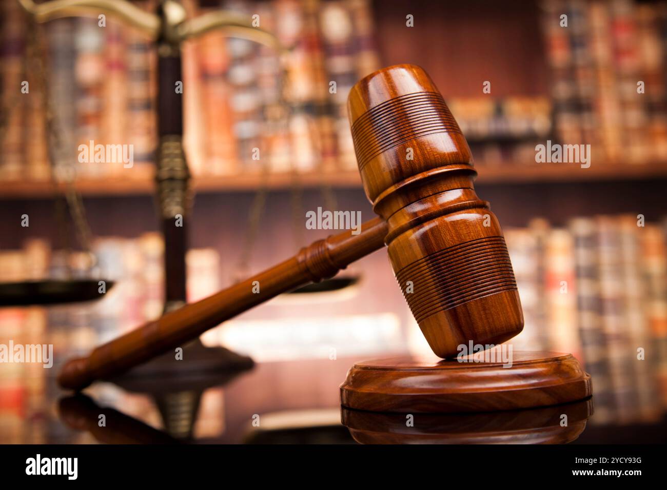 Law books, mallet of the judge, Courtroom background Stock Photo - Alamy