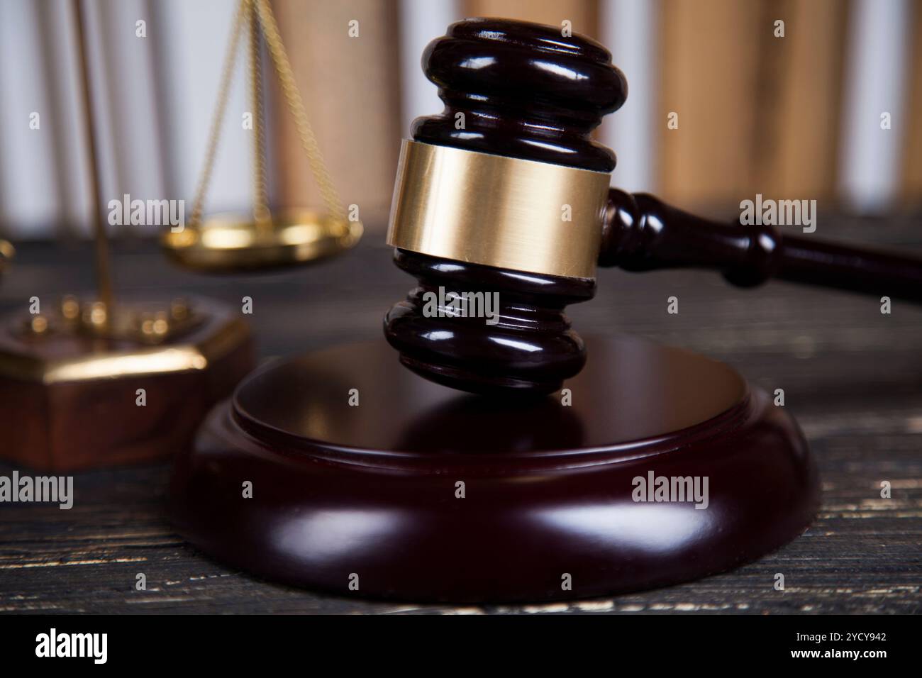 Law book, mallet of the judge, justice scale, wooden desk background ...