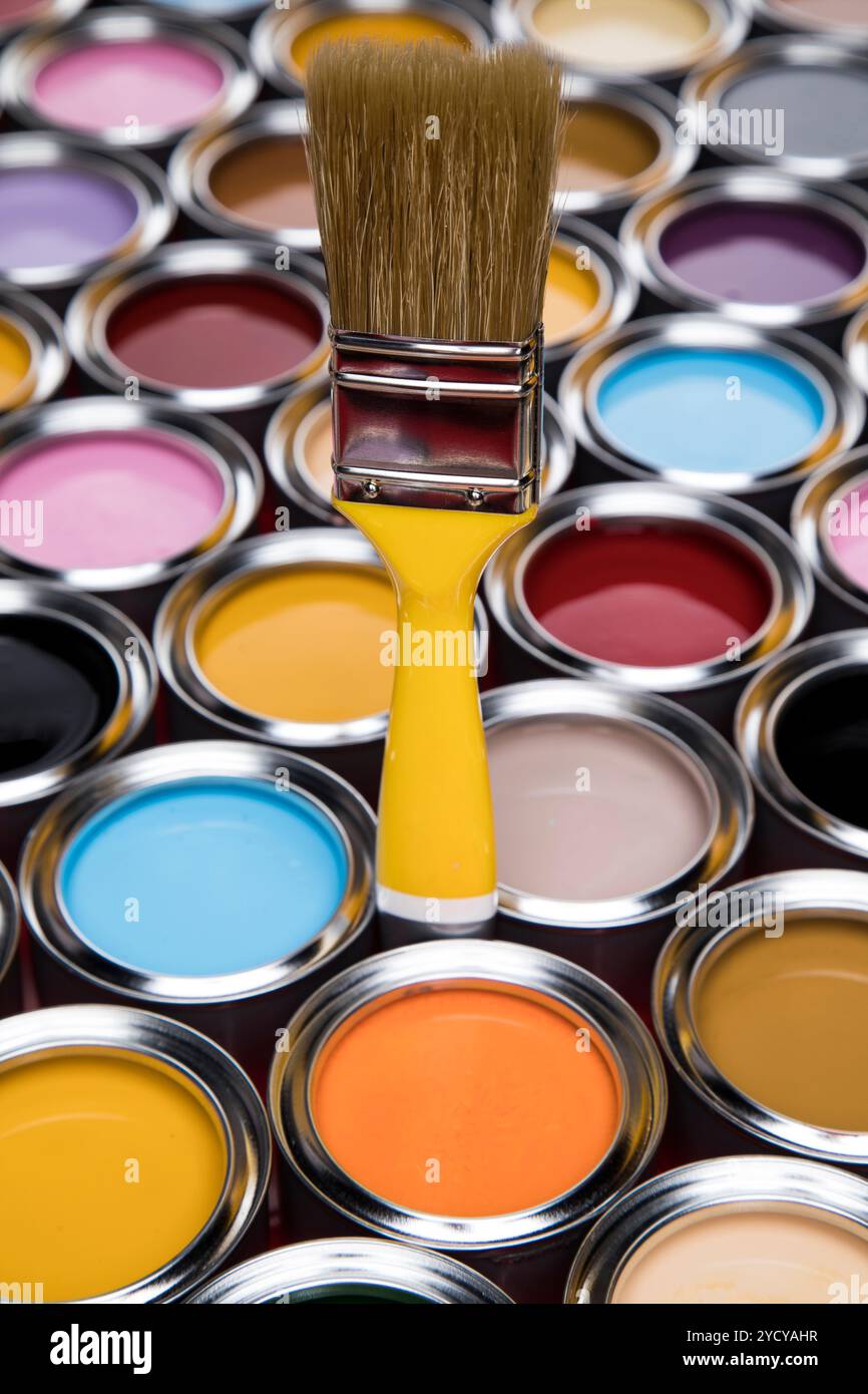 Paint brush, tin can and color guide samples Stock Photo - Alamy