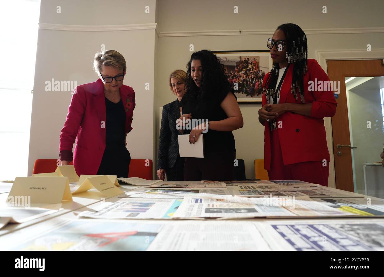 Home Secretary Yvette Cooper looking at exhibits during a visit to the ...