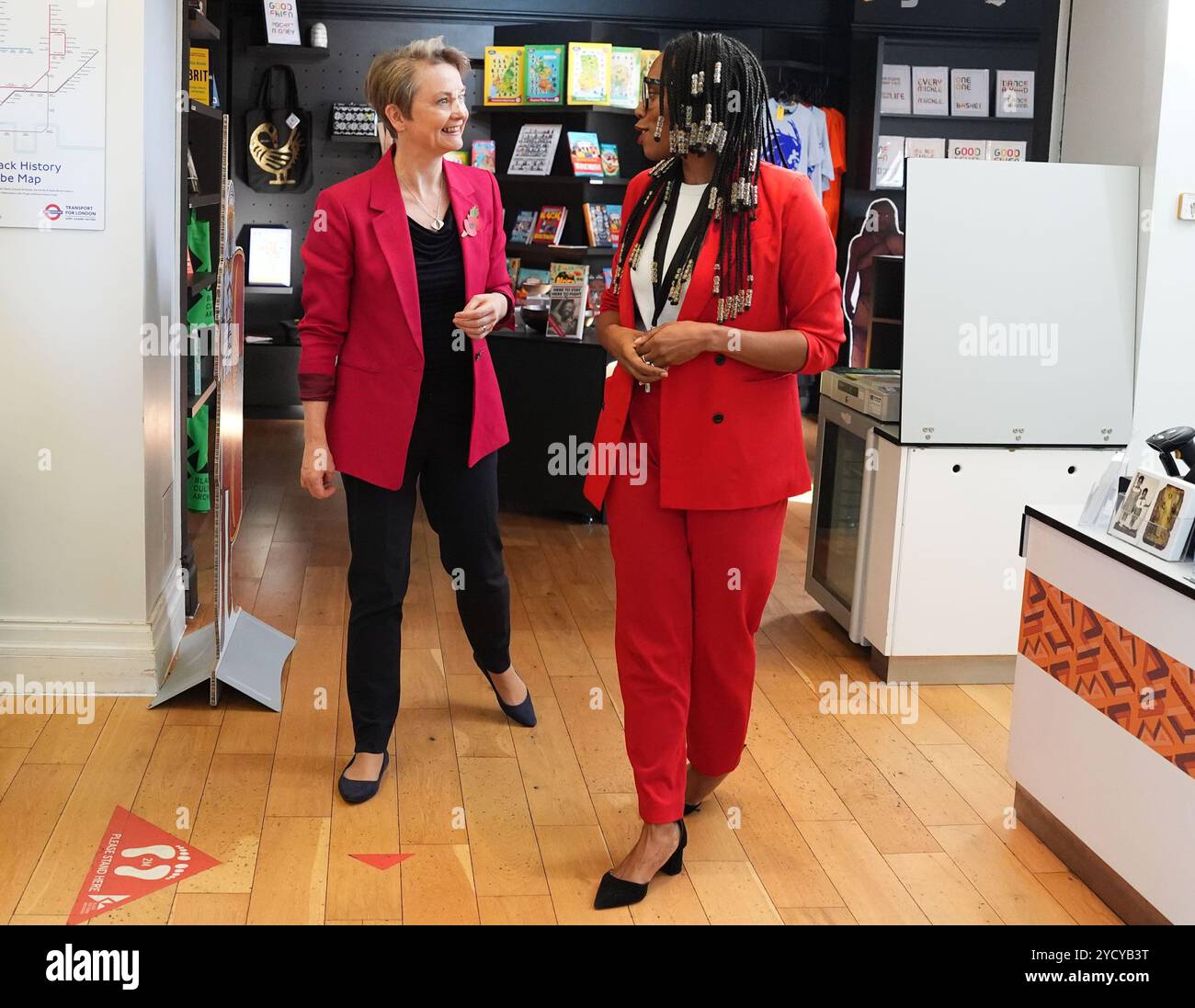 Home Secretary Yvette Cooper, with Director Lisa Anderson, during a ...