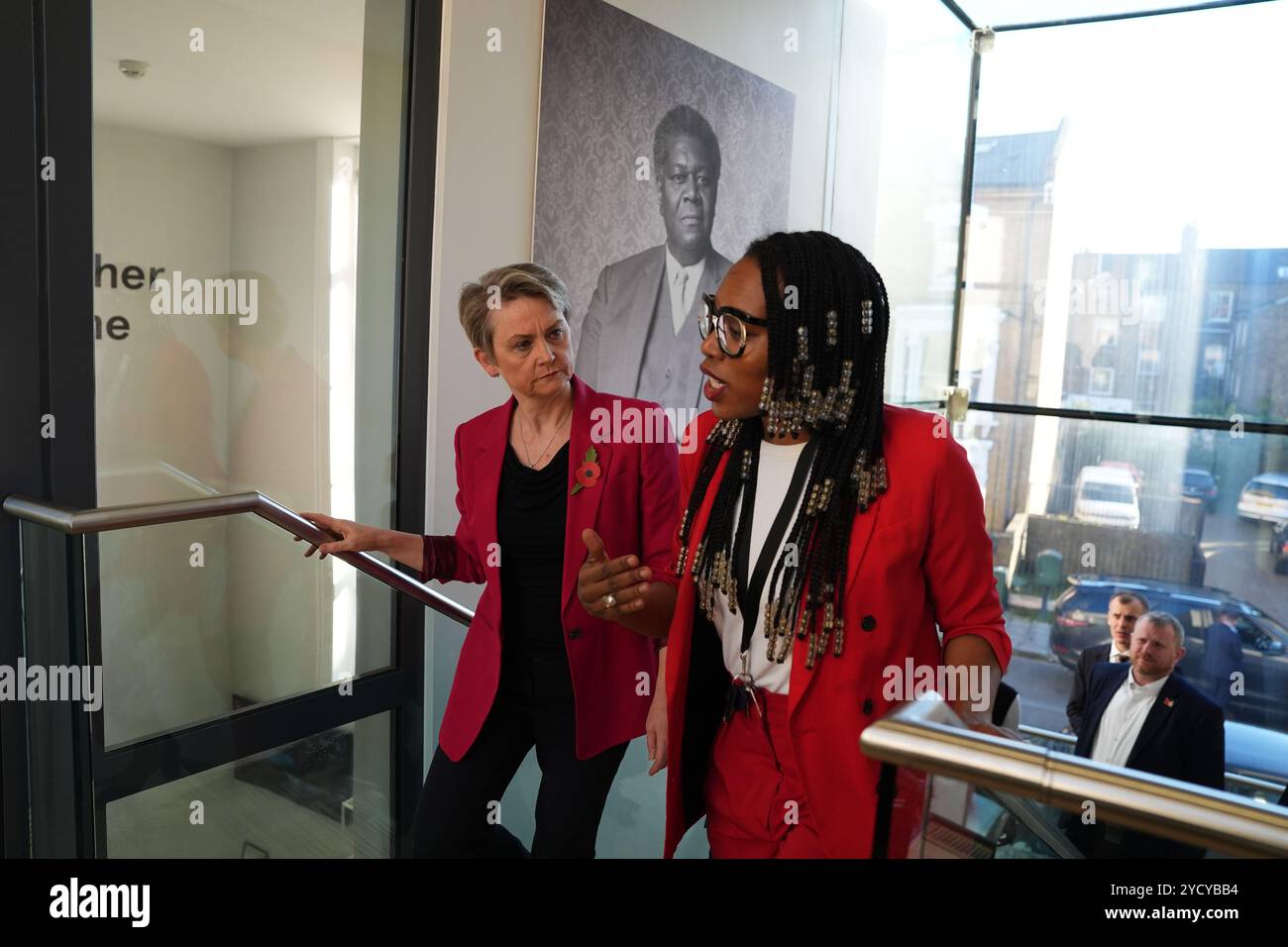 Home Secretary Yvette Cooper, with Director Lisa Anderson, during a ...
