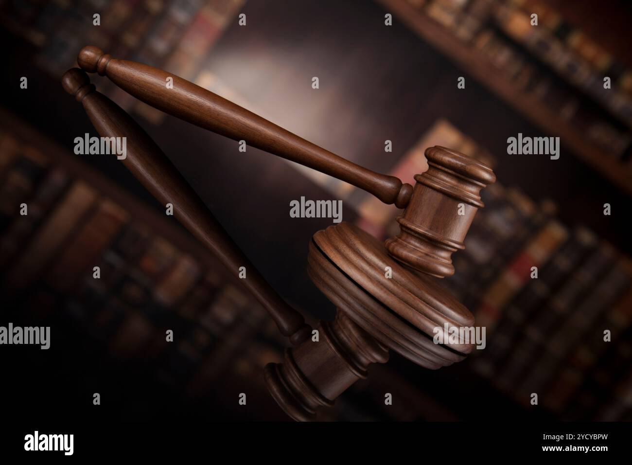 Law books, mallet of the judge, Courtroom background Stock Photo - Alamy