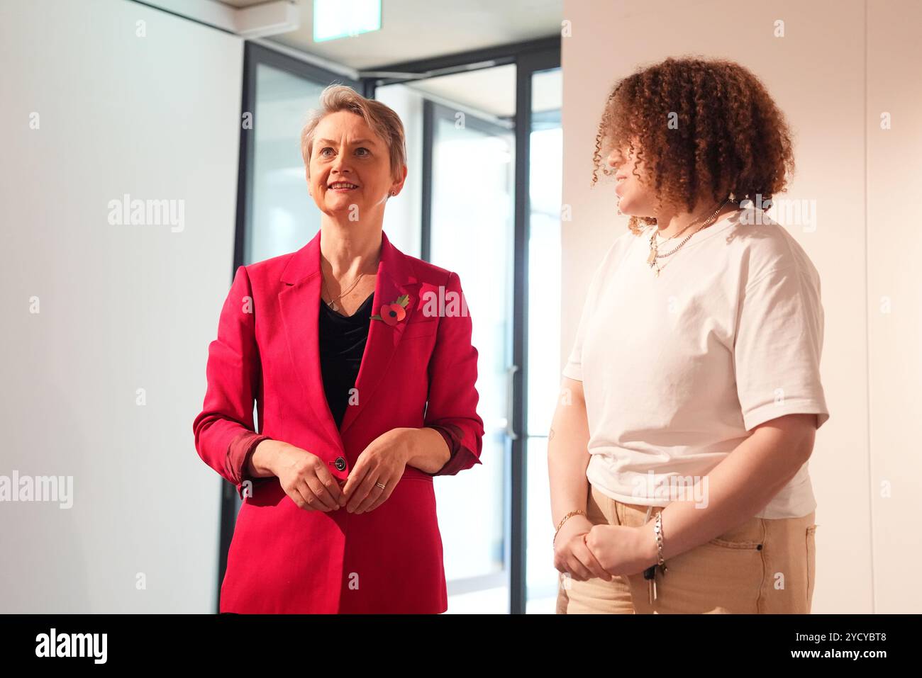 Home Secretary Yvette Cooper, with Curator Harlynn Homan, during a ...