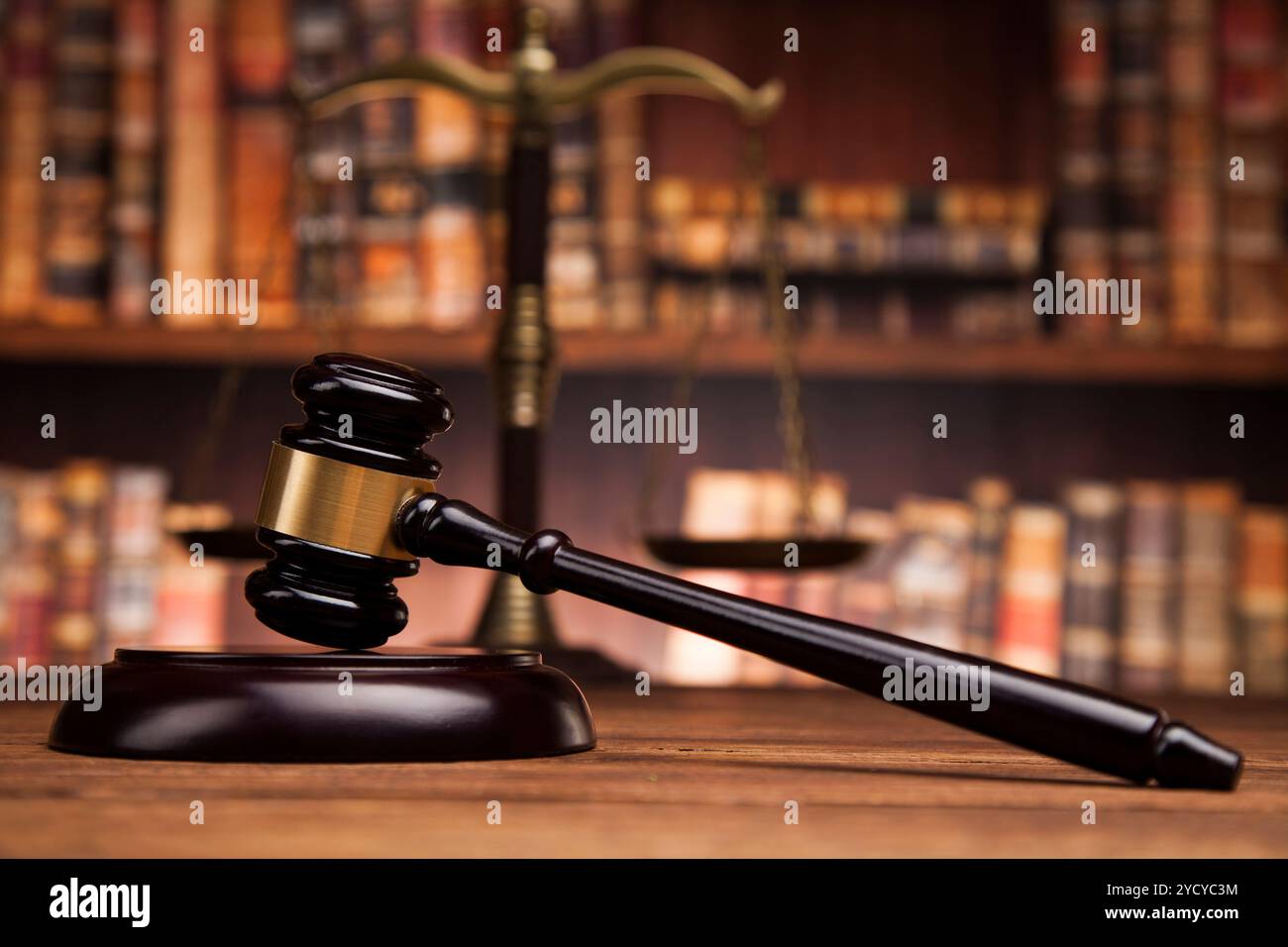 law theme, mallet of the judge, justice scale, books, wooden desk Stock Photo - Alamy