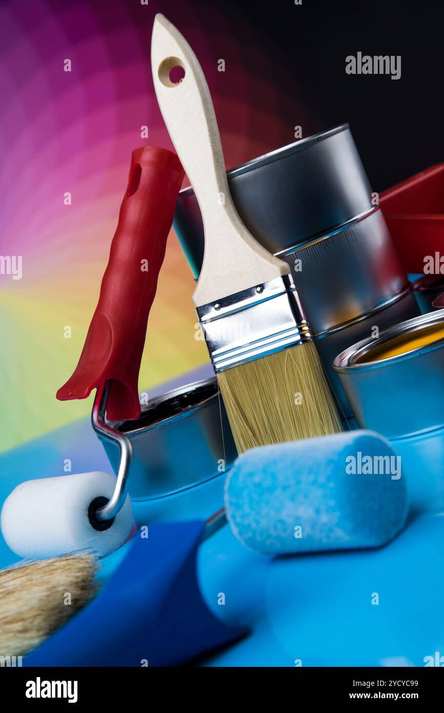Paint brush, tin can and color guide samples Stock Photo - Alamy