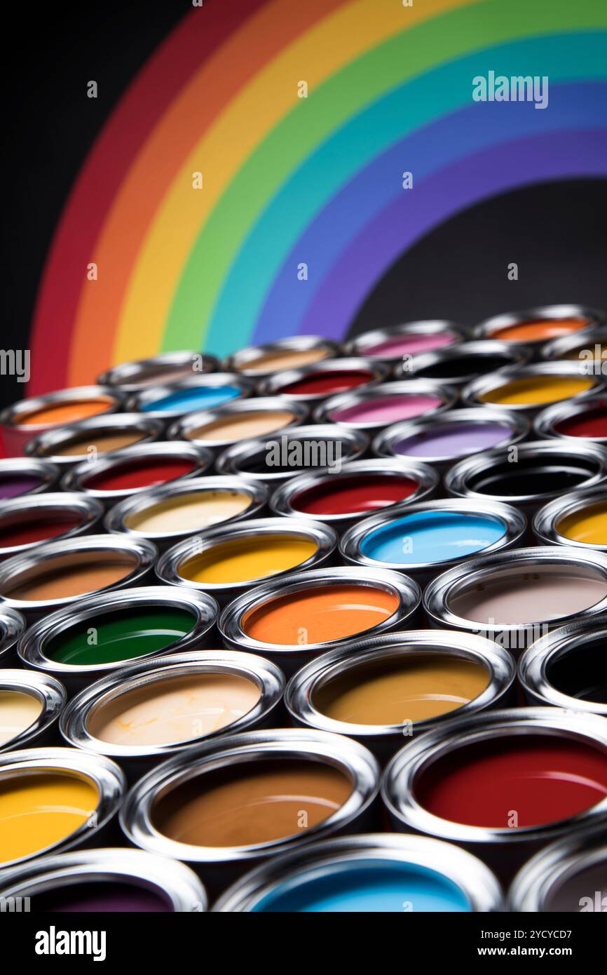 Rainbow colors, Open cans of paint Stock Photo - Alamy