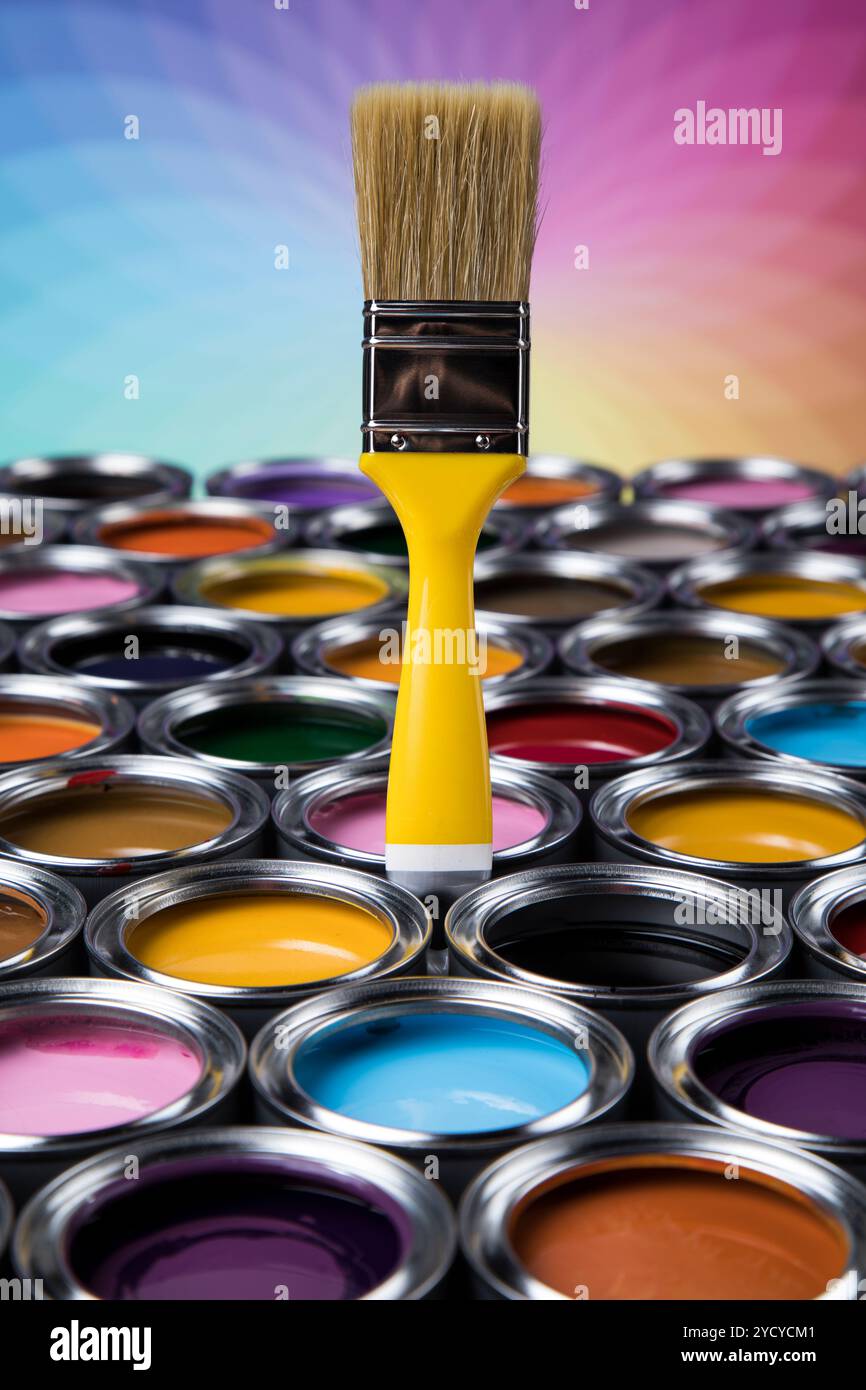 Paint brush, tin can and color guide samples Stock Photo - Alamy