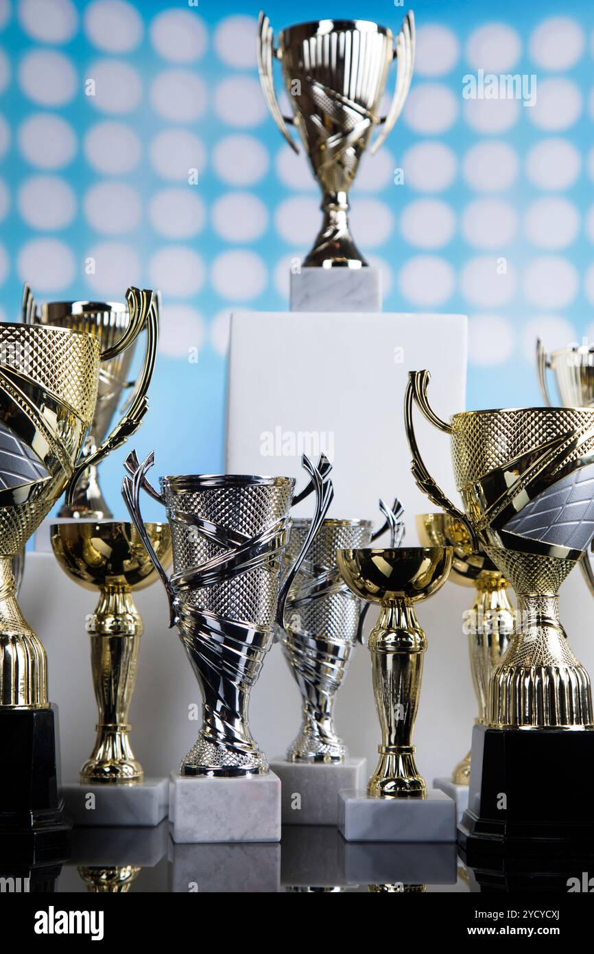 Sport podium, Cups of winners award Stock Photo - Alamy