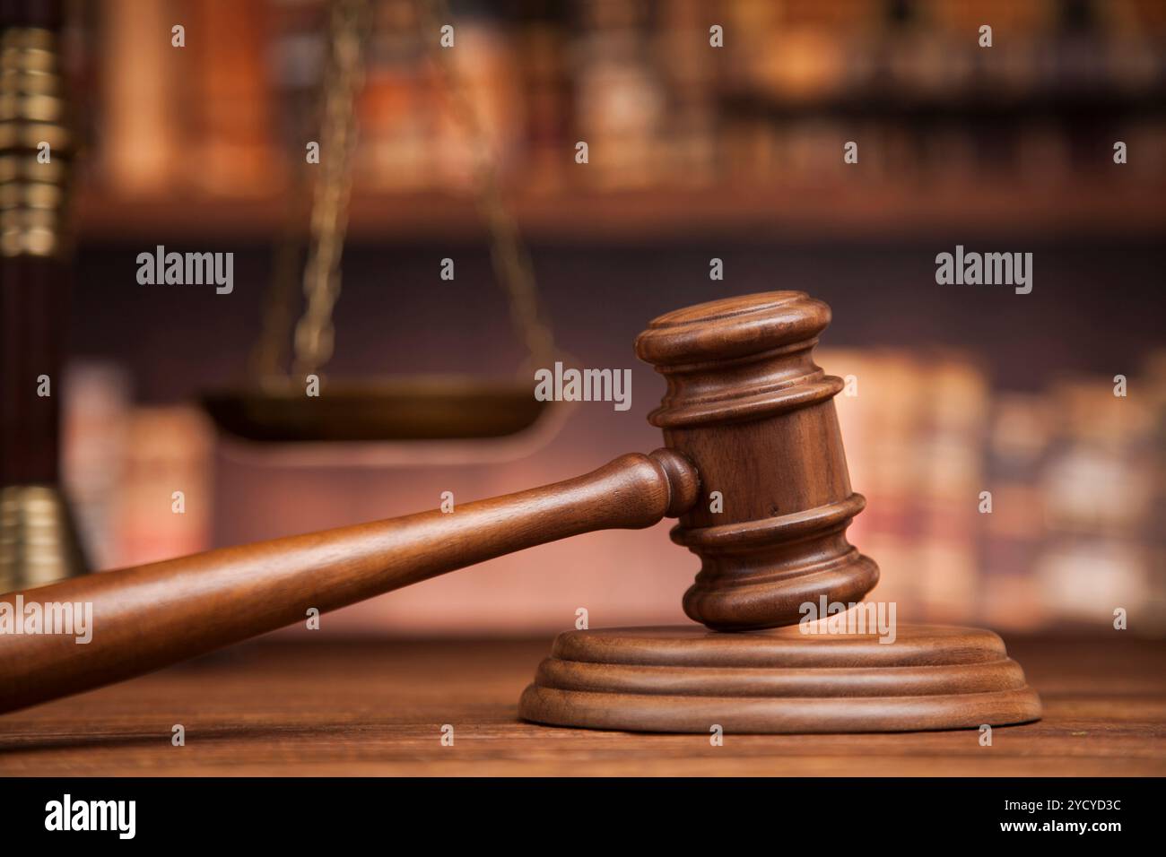 Law books, mallet of the judge, Courtroom background Stock Photo - Alamy