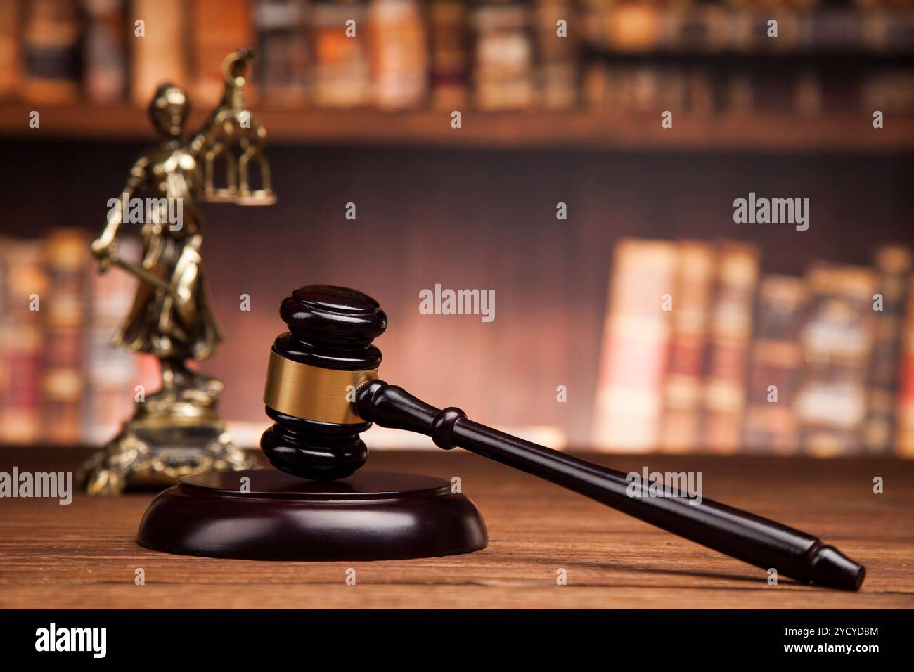 law theme, mallet of the judge, justice scale, books, wooden desk Stock Photo - Alamy
