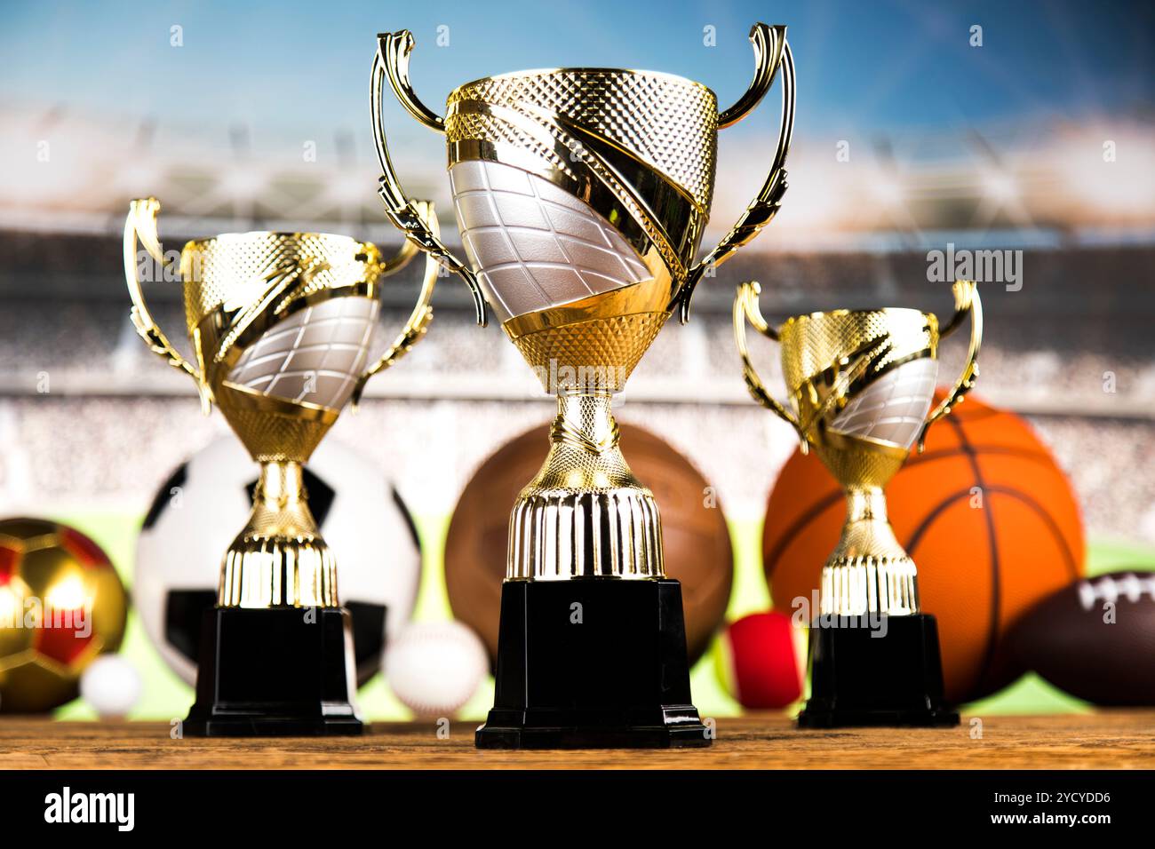 Winner trophy, Sport equipment and balls Stock Photo - Alamy