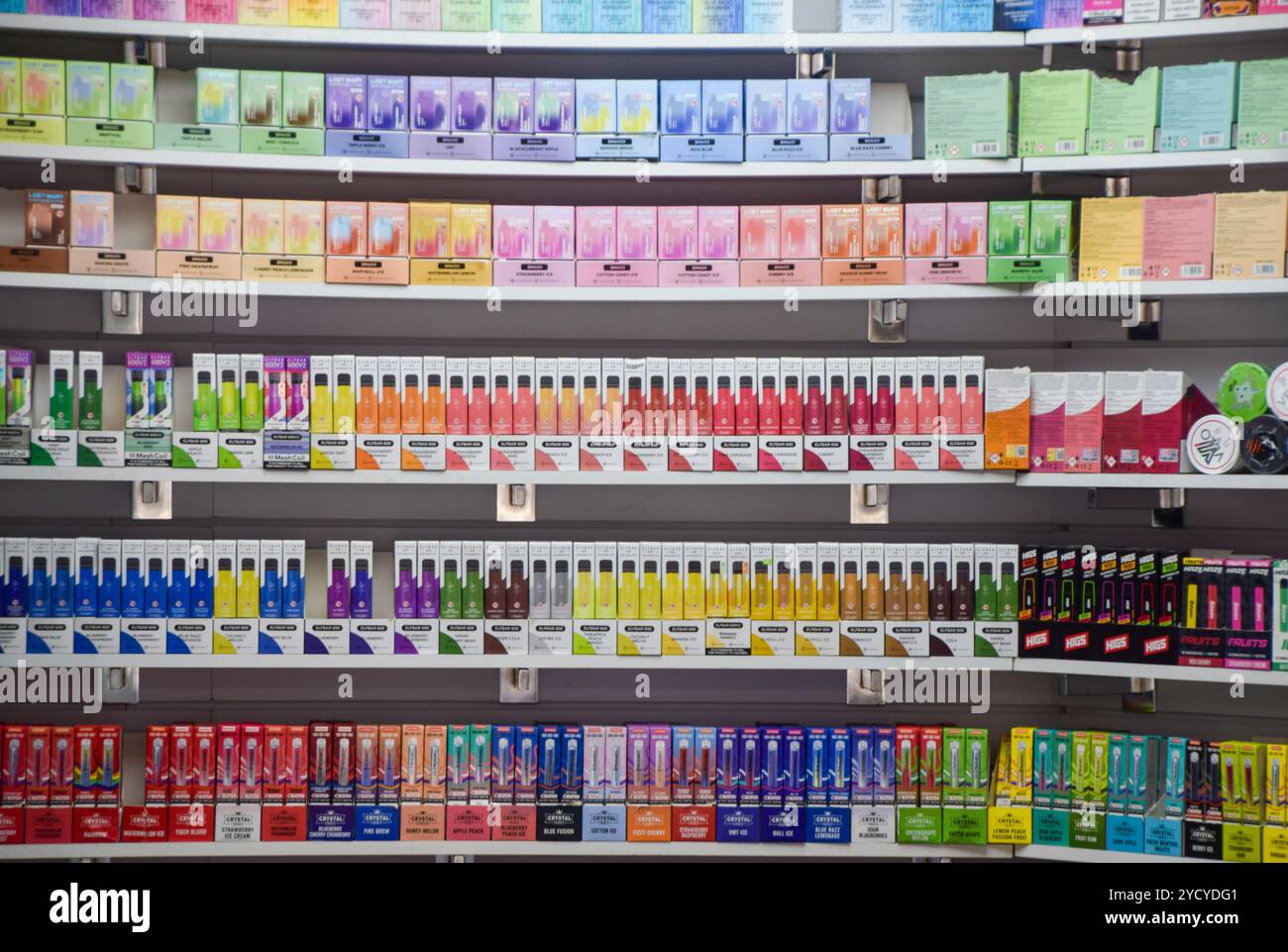 London, UK. 24th October 2024. Colourful vapes on display at a store in ...