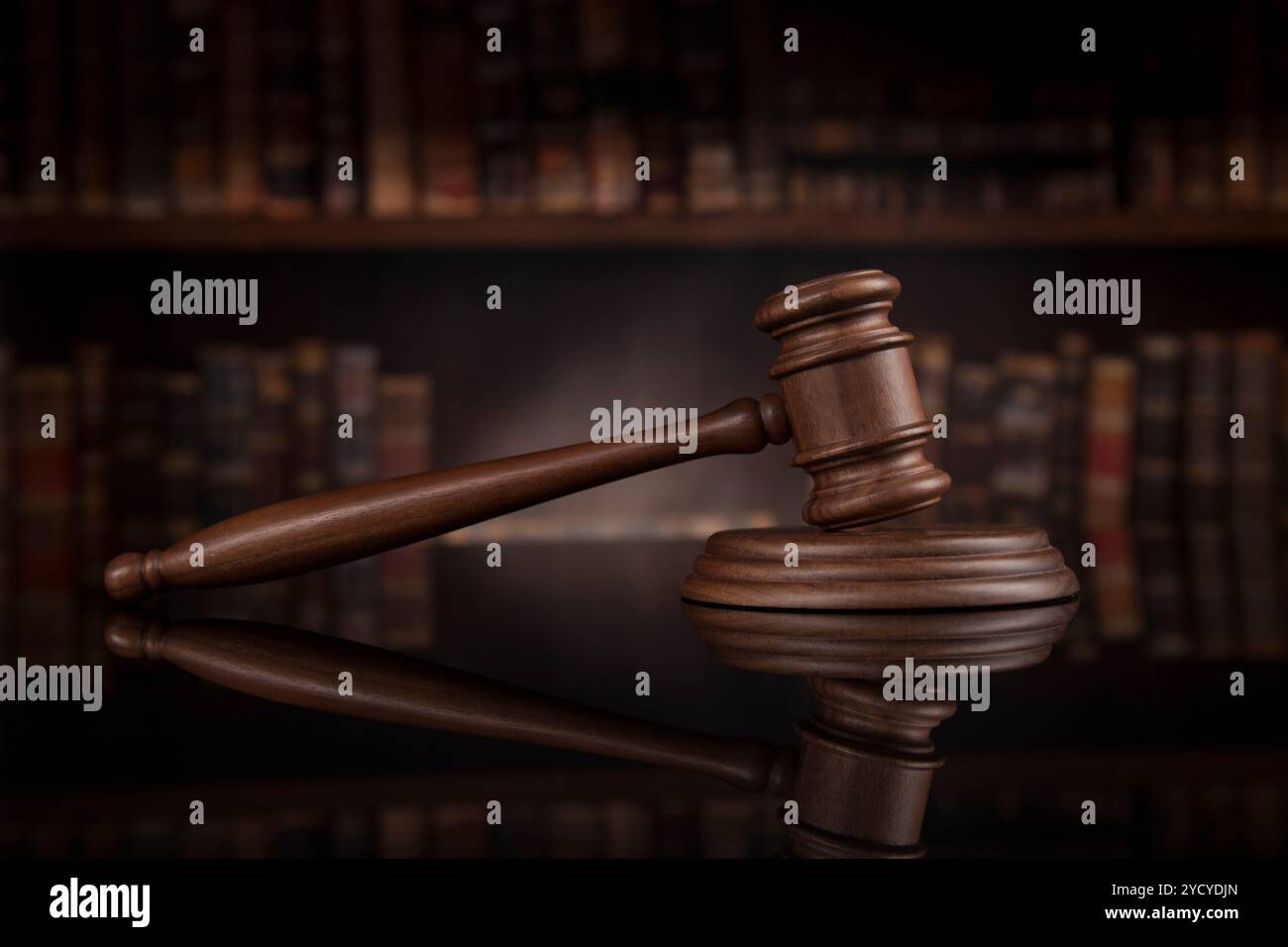 Law theme, mallet of the judge, wooden desk, books Stock Photo - Alamy